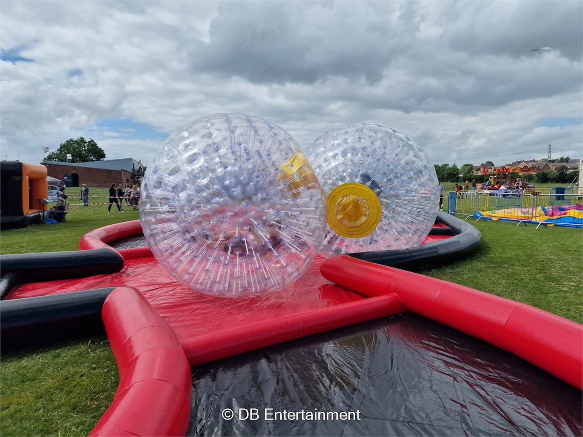 Zorbs with Kris Cross Track - Inflatable Funfair & Exhibition Game Hire ...
